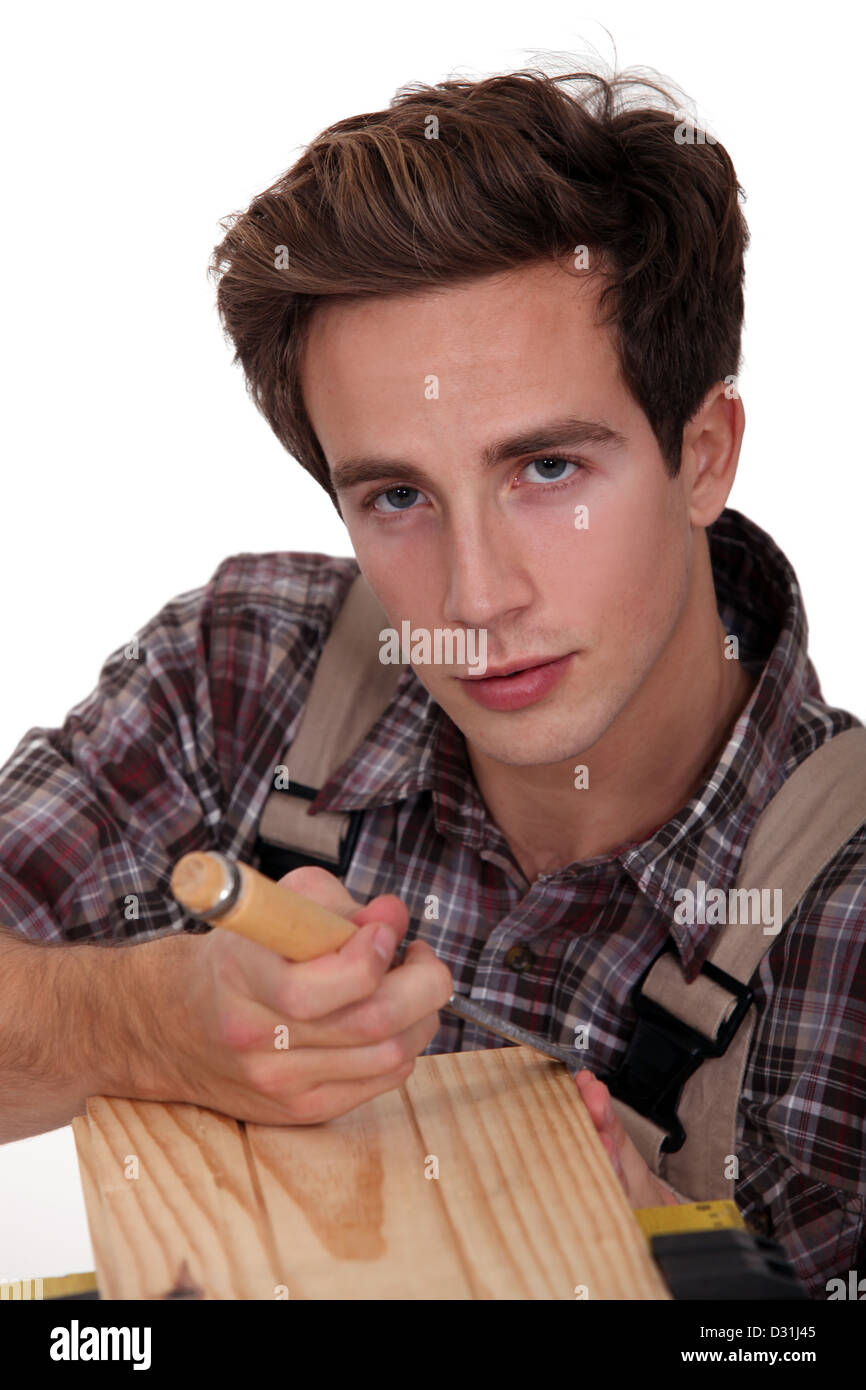 A carpenter using a chisel Stock Photo - Alamy