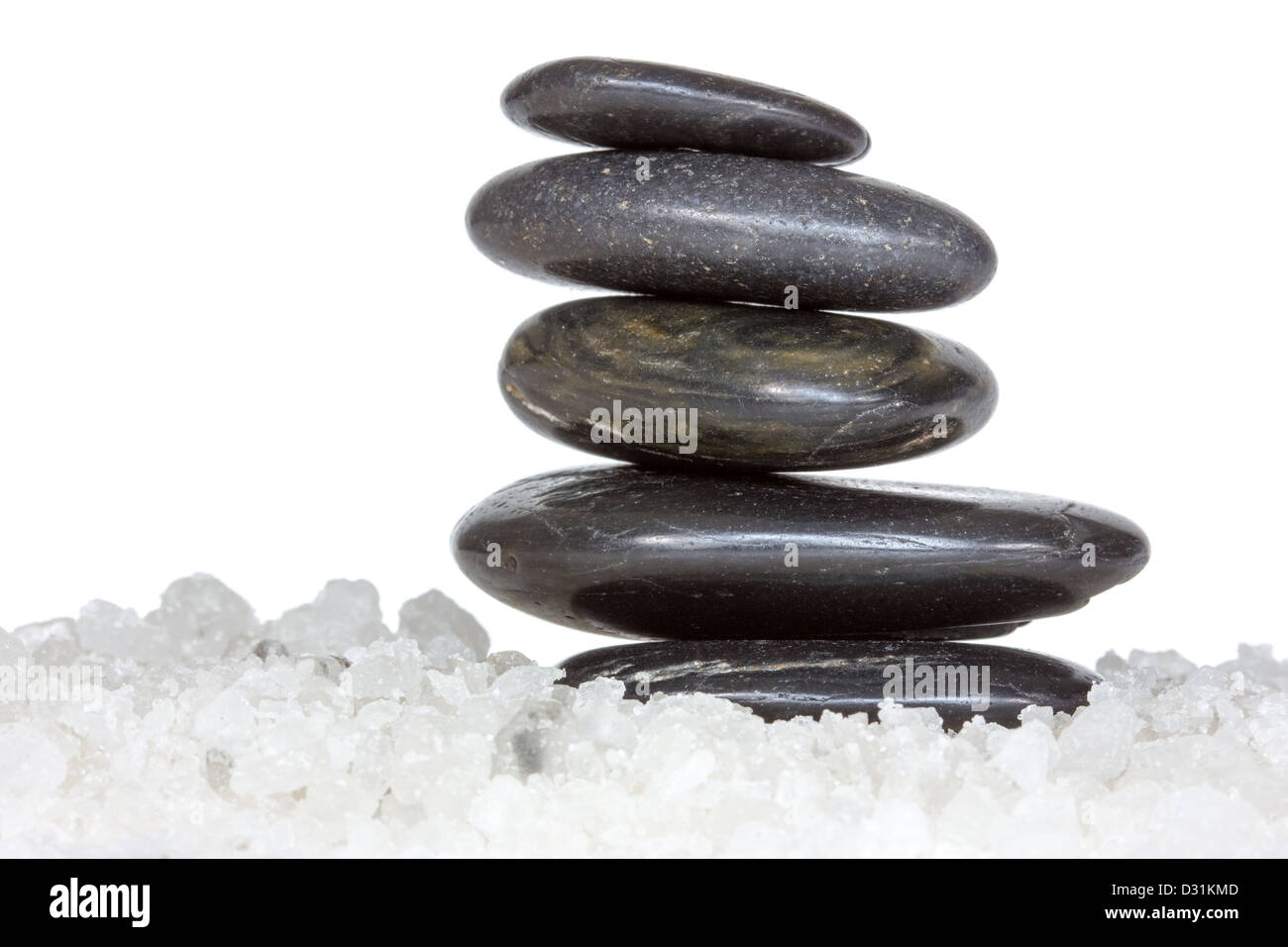 Spa stones in a sea salt, isolated over a white background Stock Photo ...