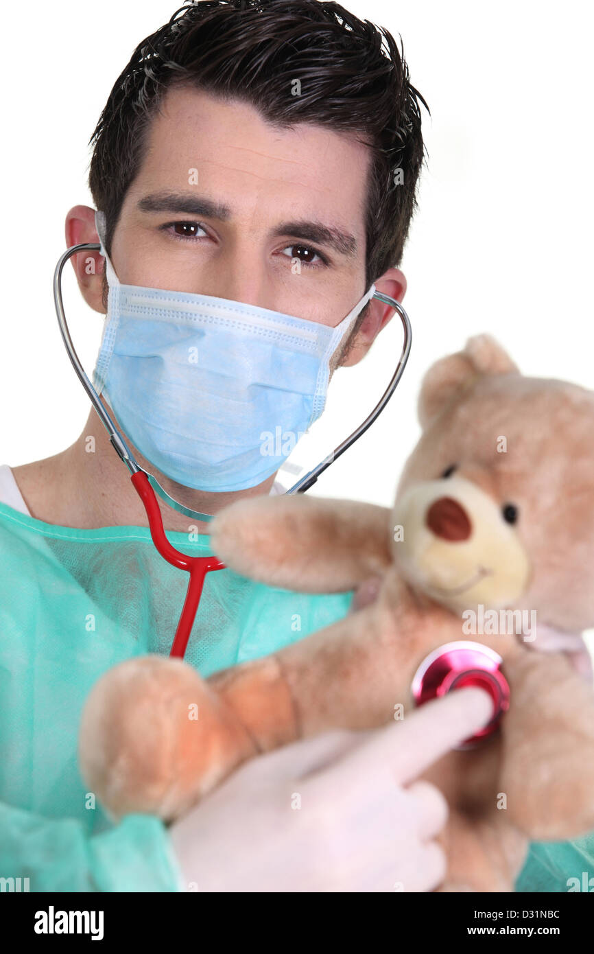 Happy pediatrician doctor teddy hi-res stock photography and images - Alamy