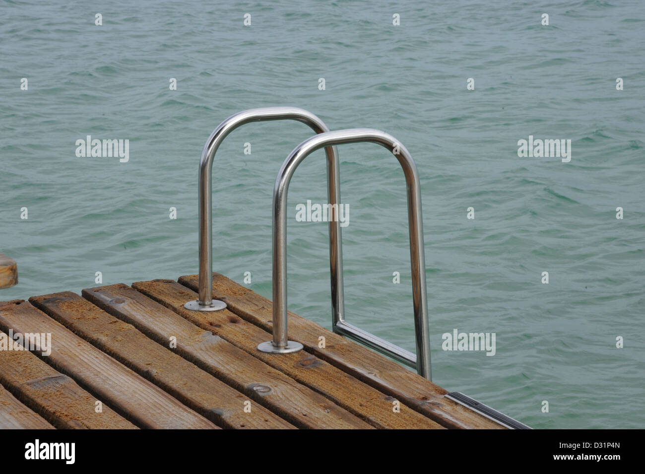 Steps at the end of a jetty connected to the Indian Ocean Stock Photo ...