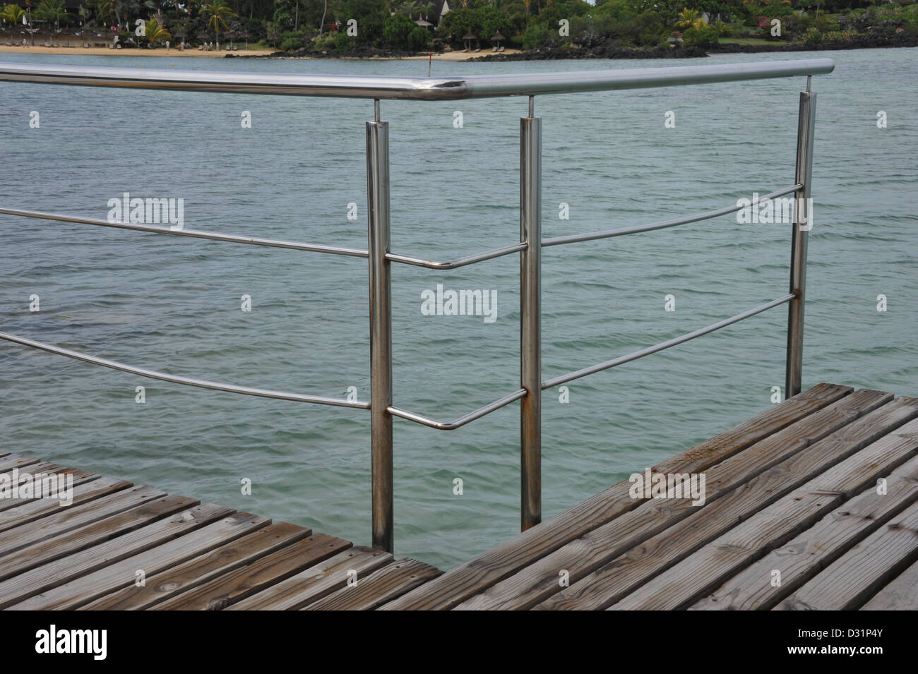 Safety rail at the end of a jetty connected to the Indian Ocean Stock ...