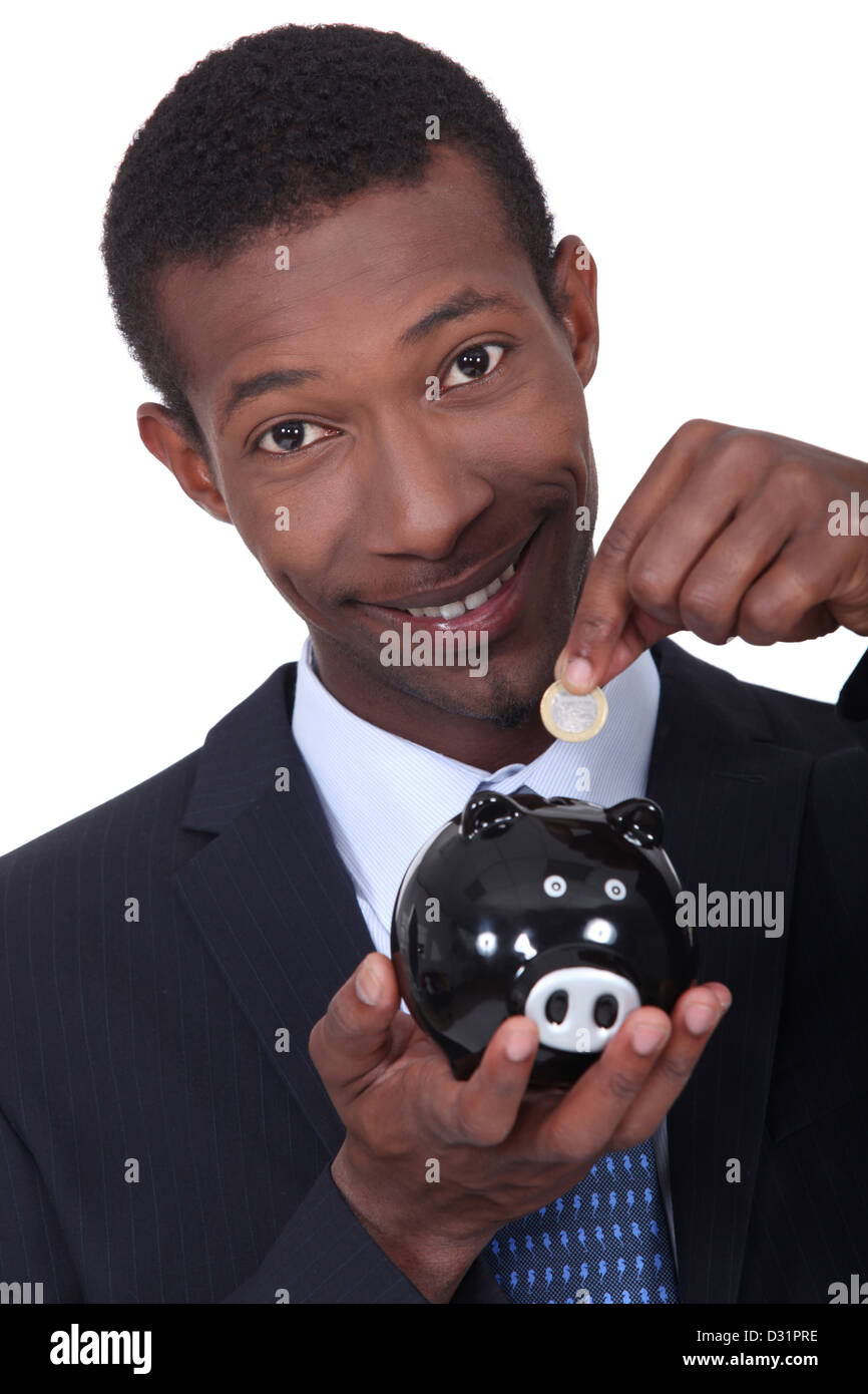 portrait of a man with money box Stock Photo - Alamy