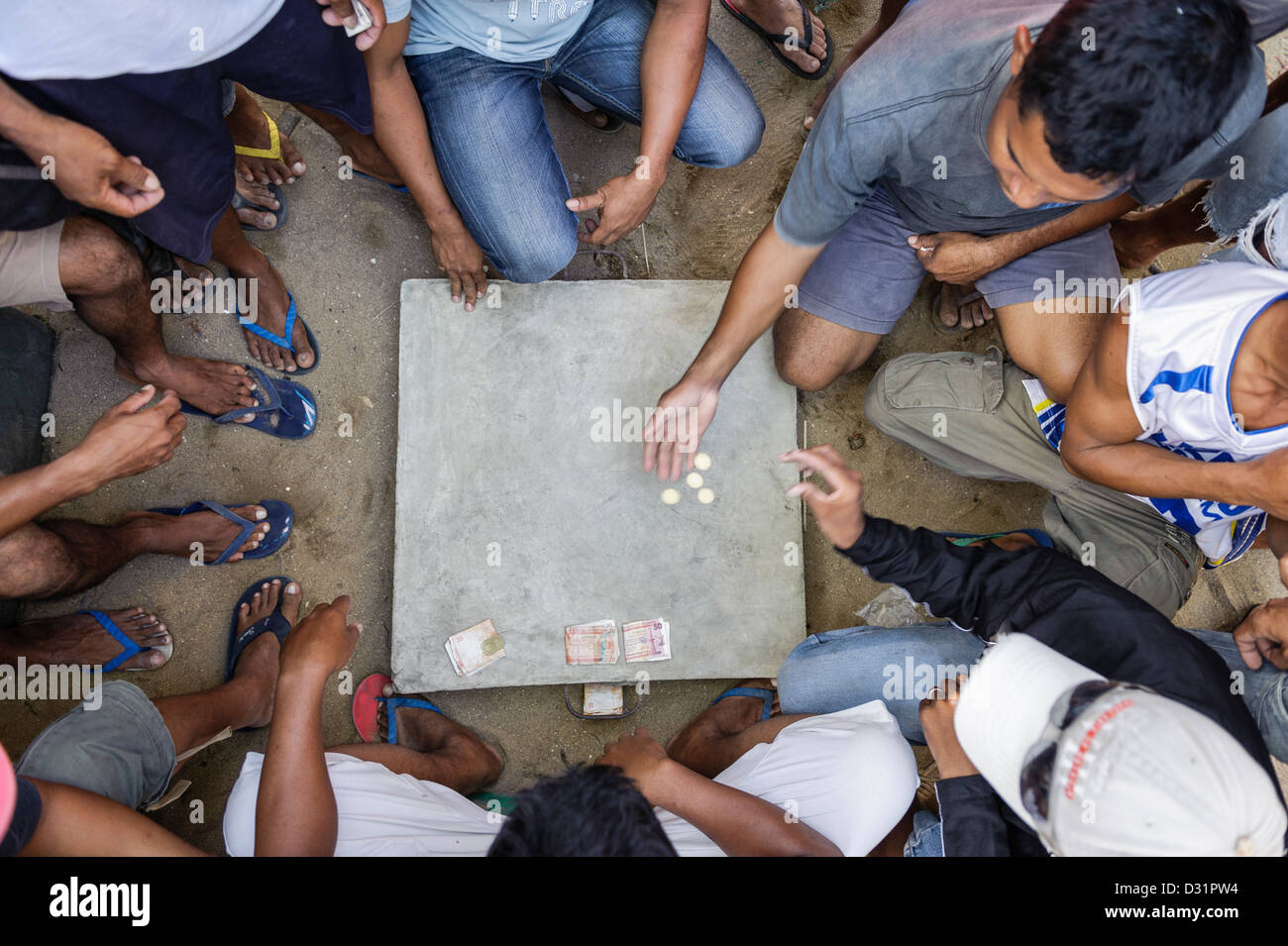 Men betting in the streets, Bulalacao, Mindoro, Philippines Stock Photo ...