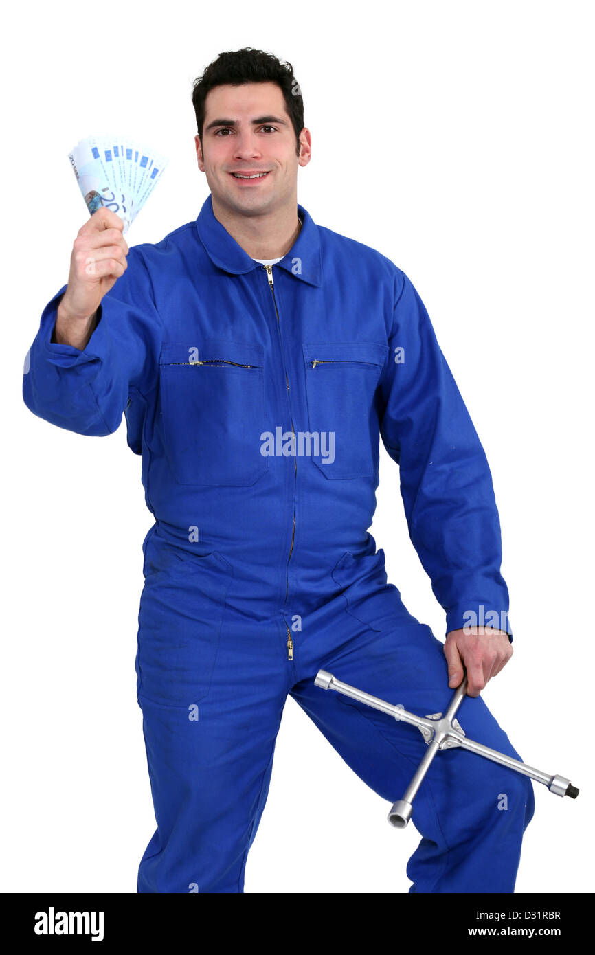 mechanic with money Stock Photo - Alamy