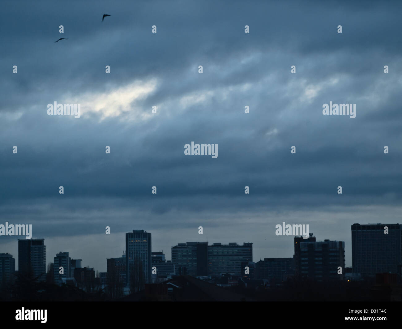 The high rise architecture of central Croydon is set against dark ...