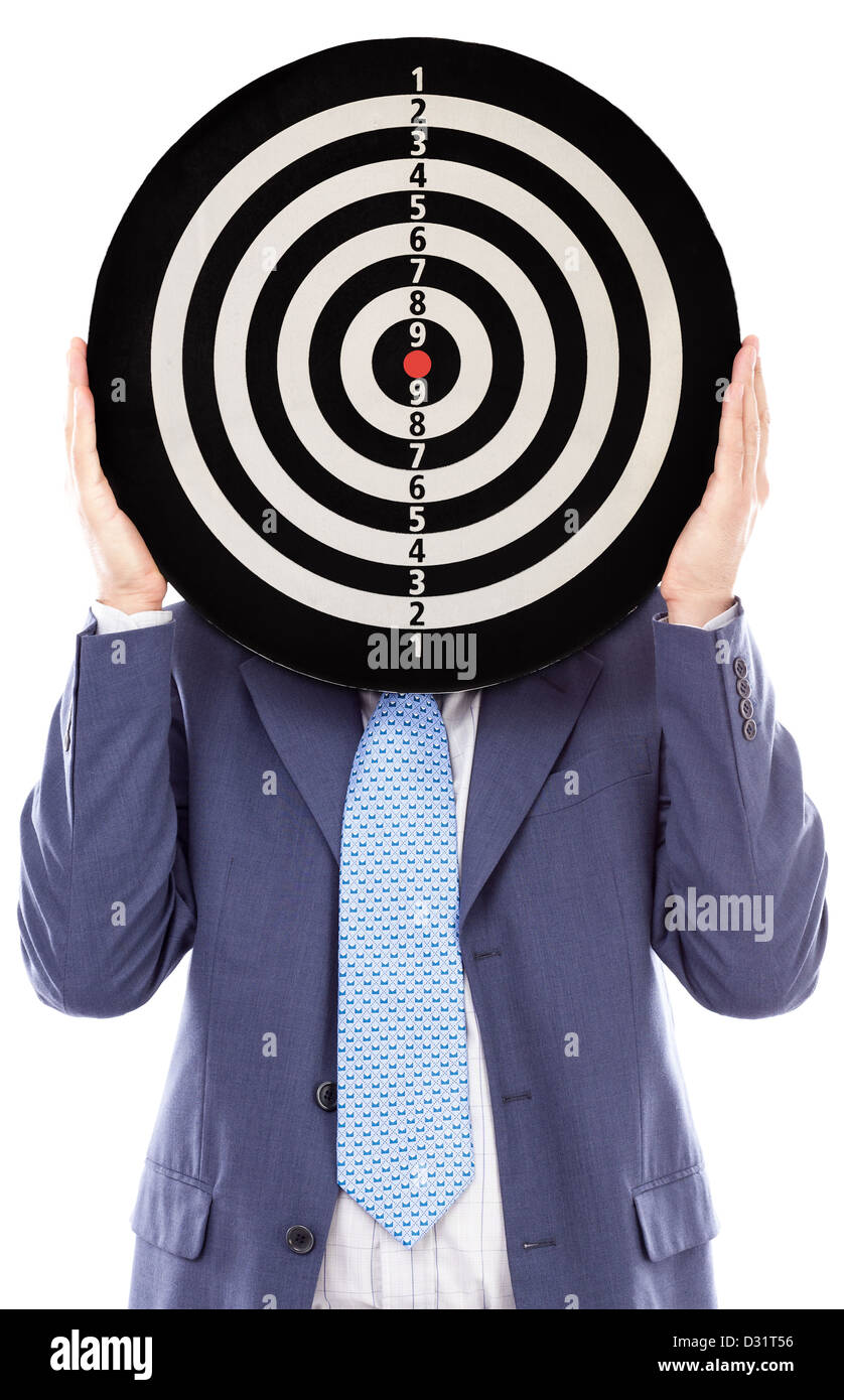 Businessman covering his face with a dartboard on white. Competition ...