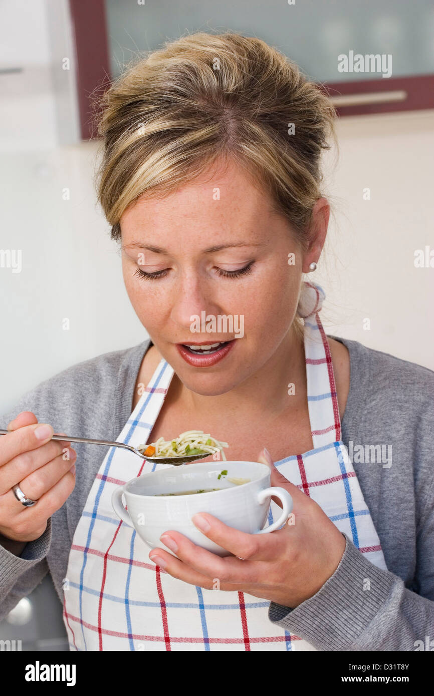 Woman eats noodle hi-res stock photography and images - Alamy
