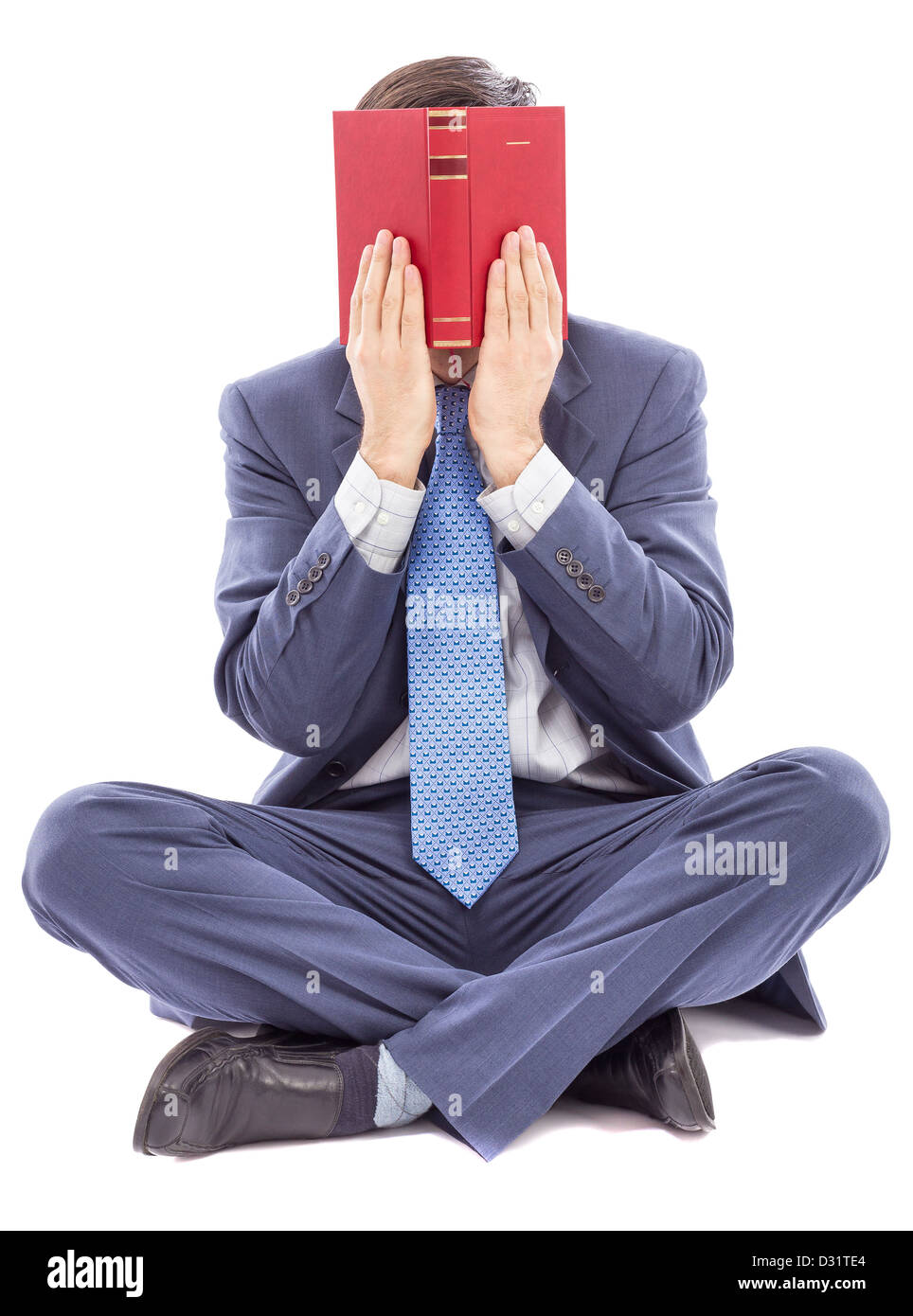 Man cross legged suit hi-res stock photography and images - Alamy