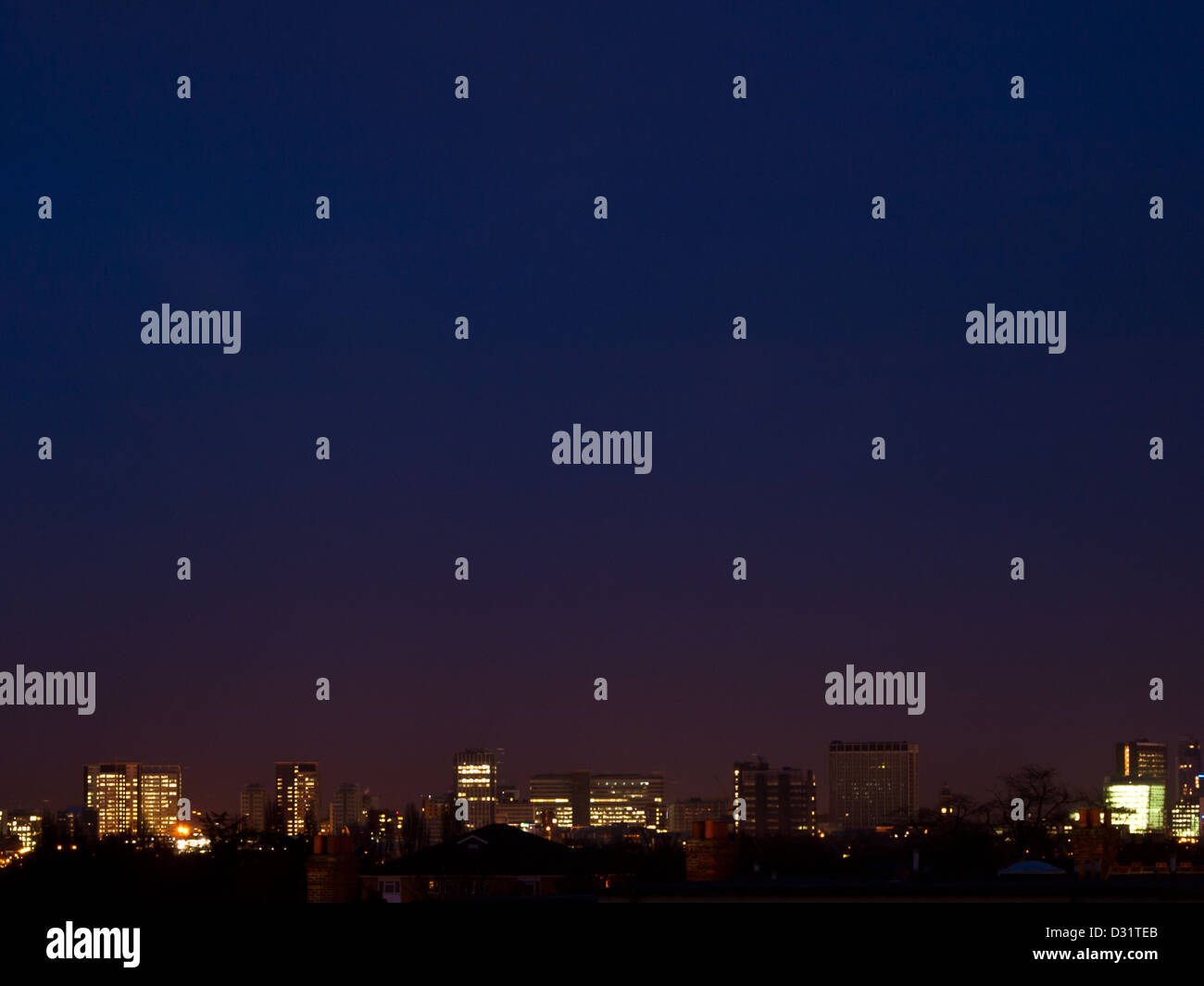 The cityscape of Croydon, south London, illuminated at night on a ...