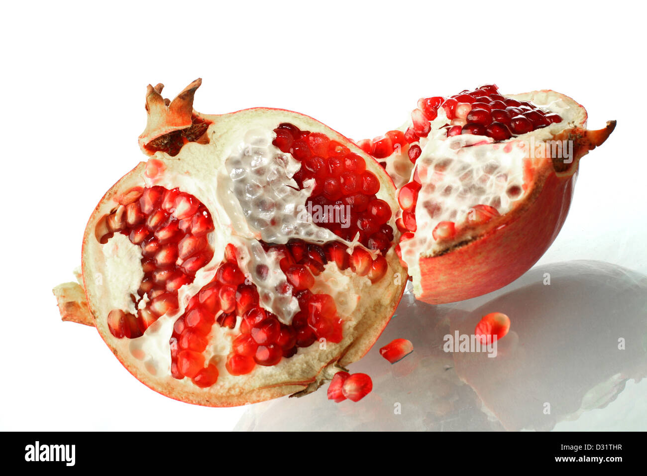 pomegranate macro close up on white background Stock Photo - Alamy
