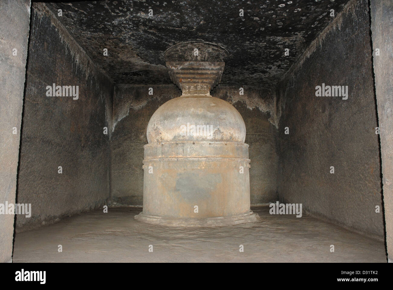 Stupa in the shrine with Harmika and umbrella touching the ceiling ...