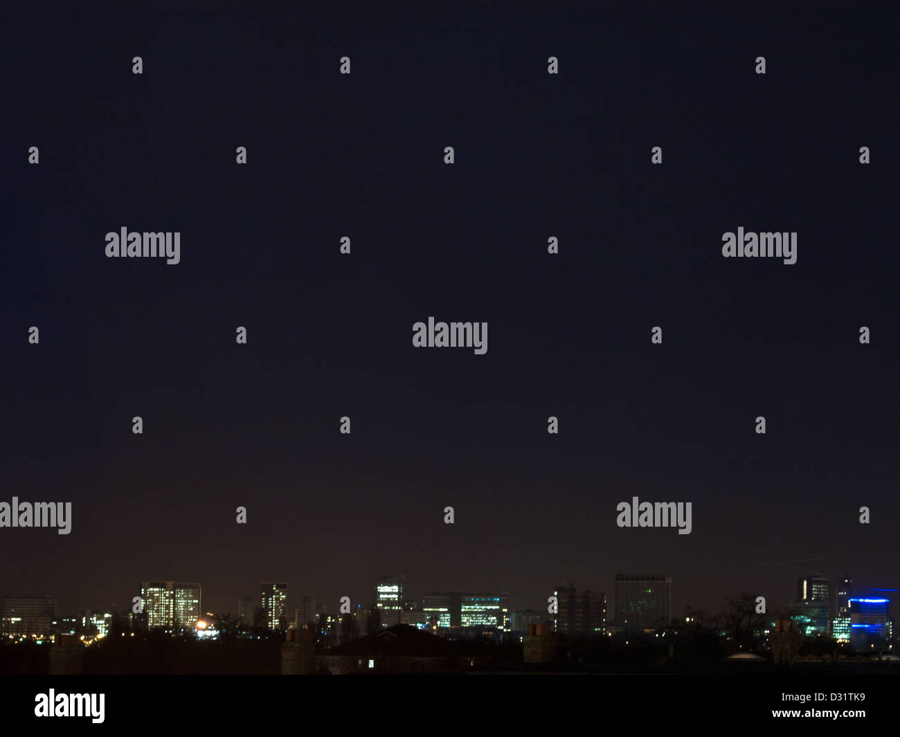 The cityscape of Croydon, south London, illuminated at night on a ...