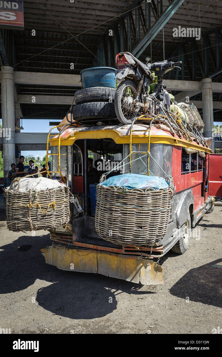 Overloaded jeepney waiting for passengers at Puerto Princesa bus ...