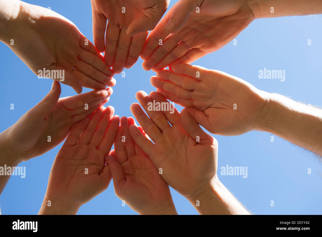 sky and hands teamwork concept Stock Photo - Alamy