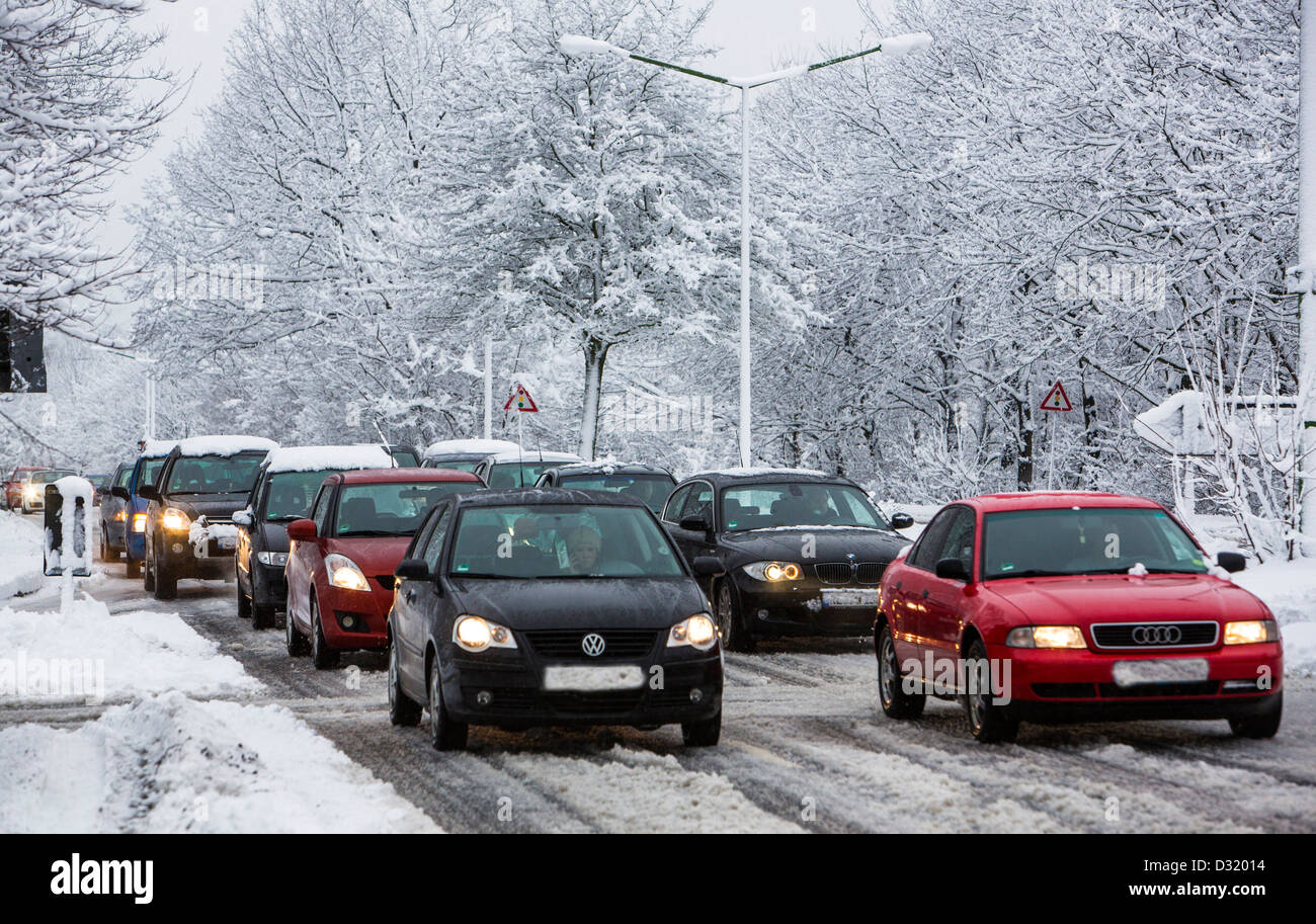 Traffic jam on city street, after heavy snow fall. Hundreds of ...