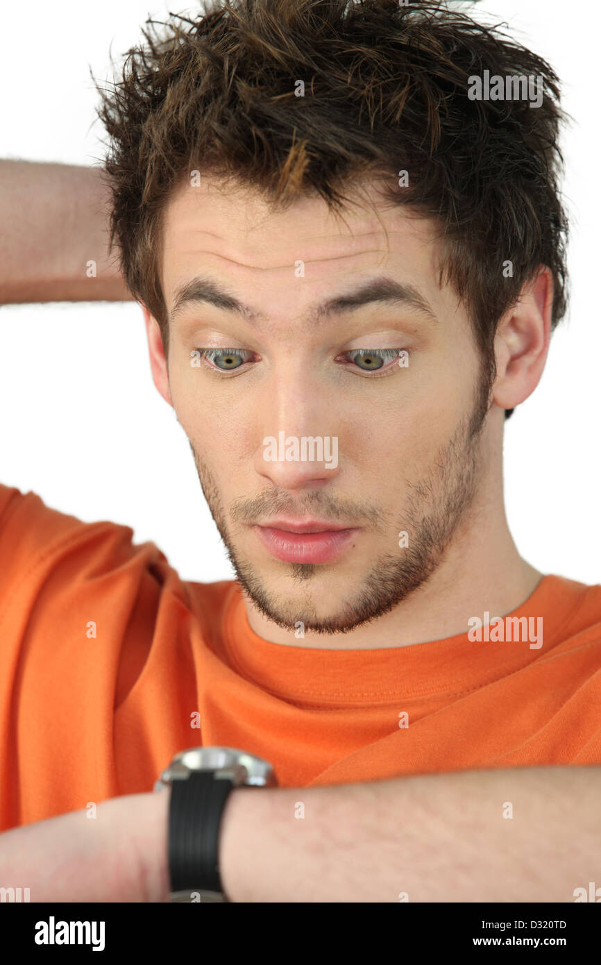 Late man looking at his watch Stock Photo - Alamy
