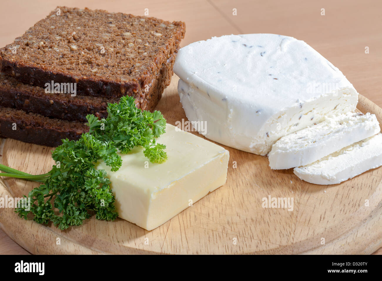 Closeup of cheese and bread with butter Stock Photo - Alamy