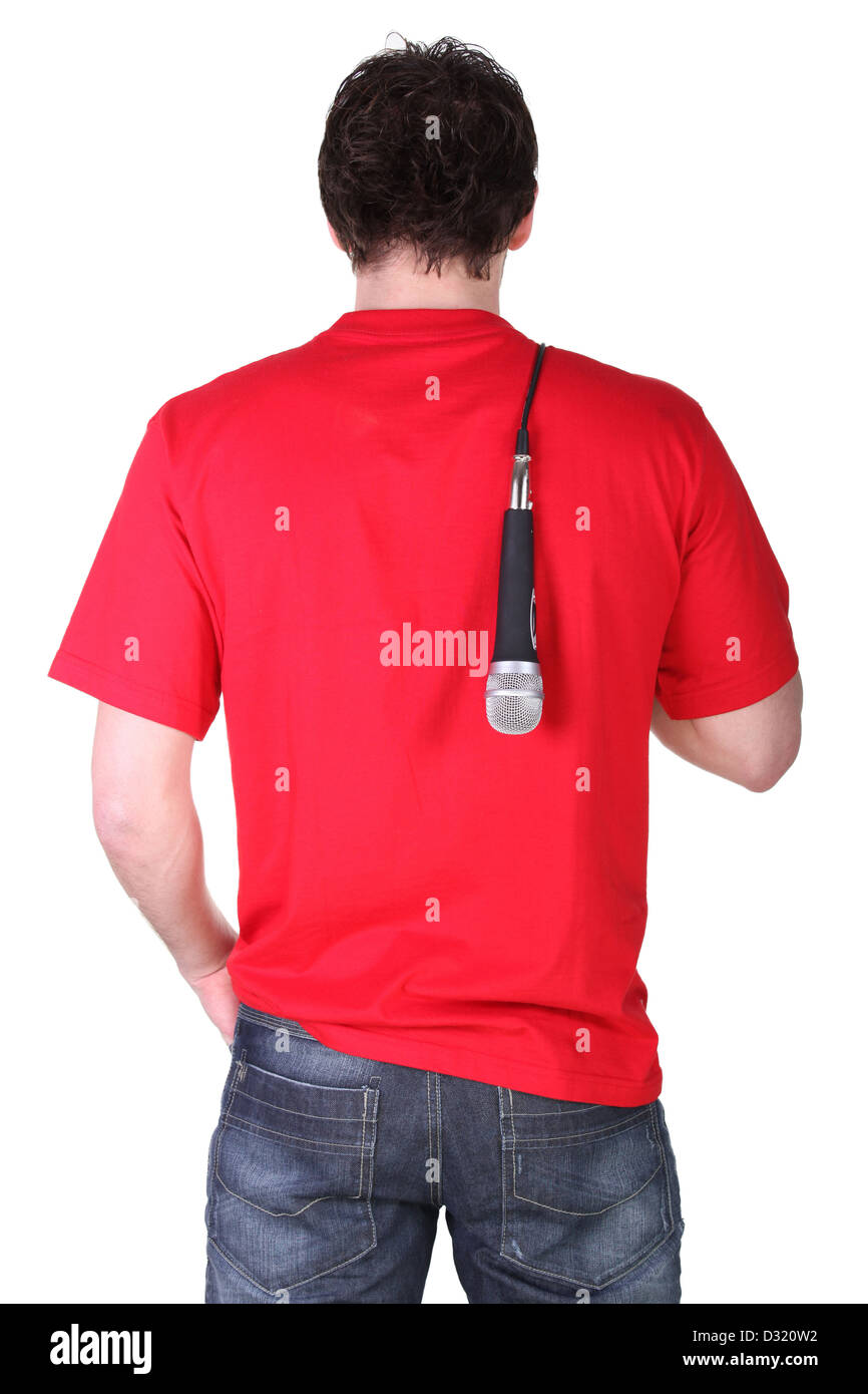 Man resting microphone over shoulder Stock Photo - Alamy