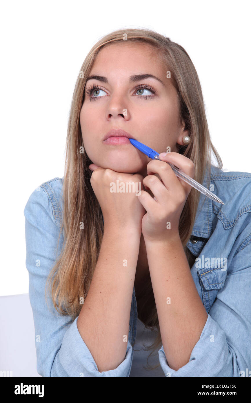 Teenager thinking pen girl hi-res stock photography and images - Alamy