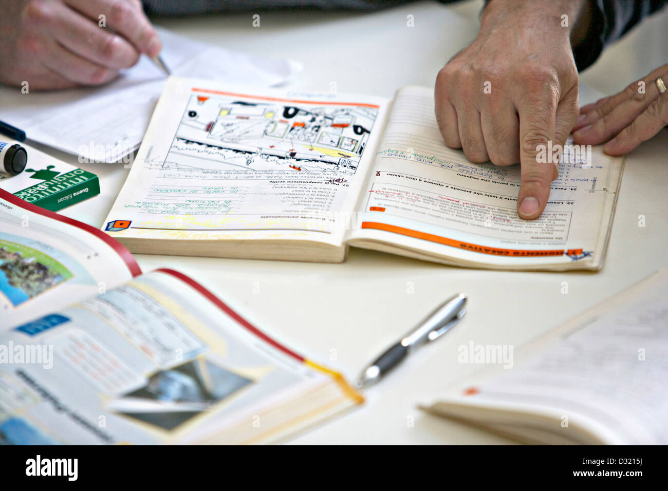 students learning in a classroom environment Stock Photo - Alamy