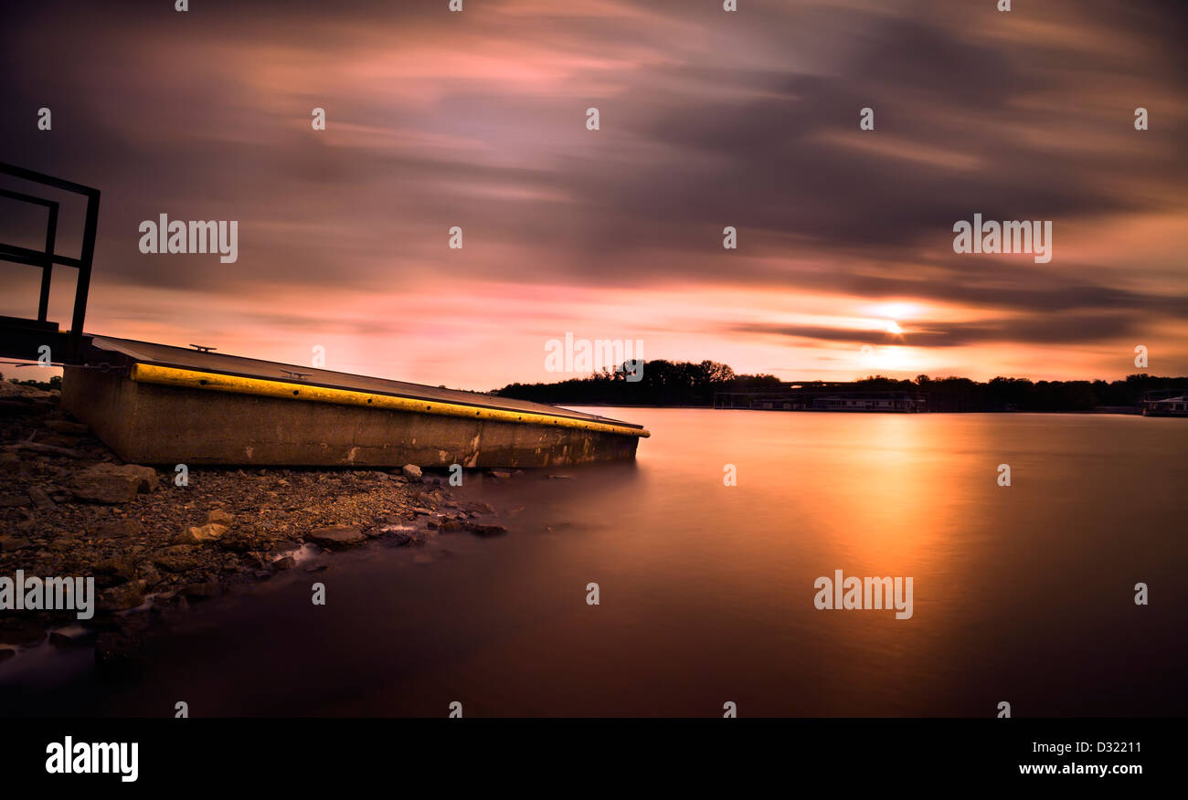 A beautiful sunrise over a lake Stock Photo - Alamy