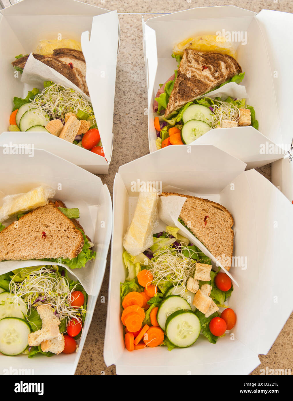 Sliced vegetables and sandwiches in lunch boxes Stock Photo - Alamy
