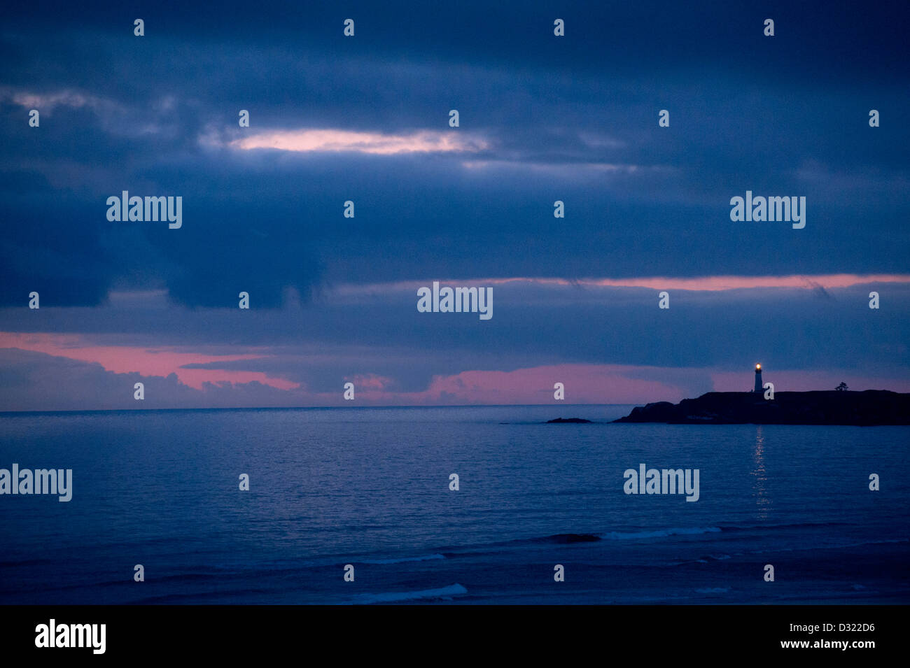 Seascape with distant lighthouse hi-res stock photography and images ...