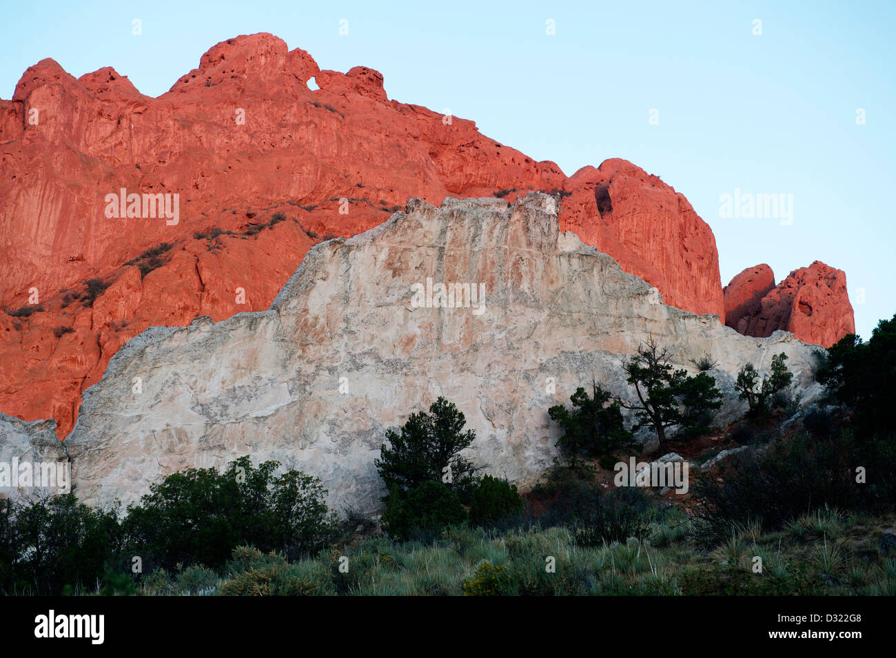 Red cliffs rising in rural landscape Stock Photo - Alamy