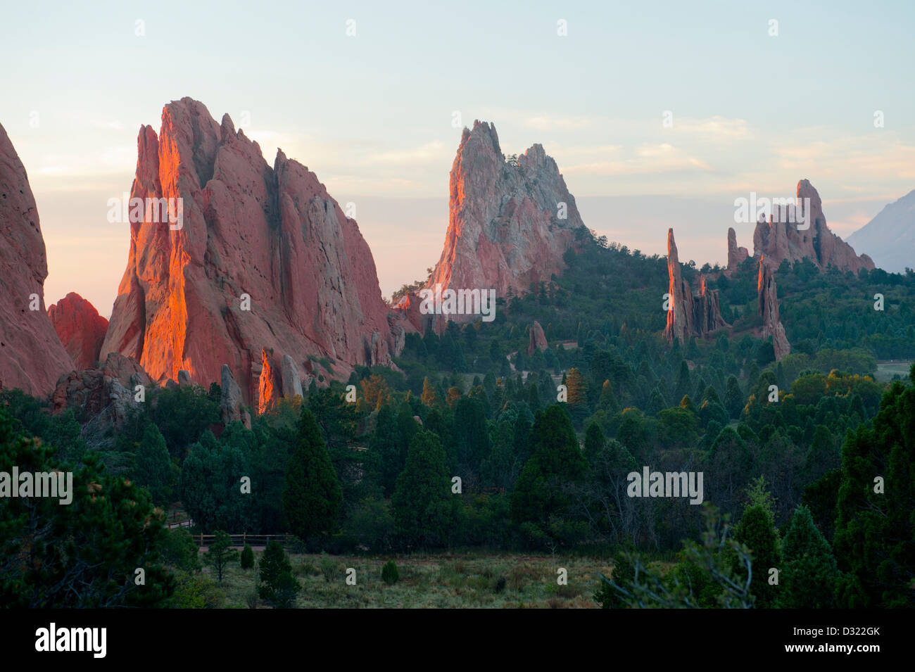 Red cliffs rising in rural landscape Stock Photo - Alamy
