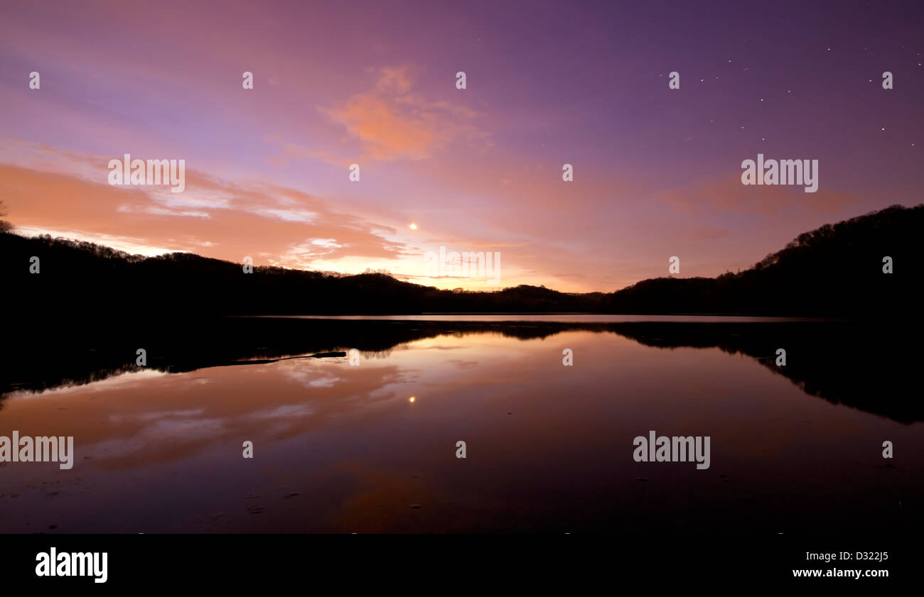 A beautiful sunrise over a lake Stock Photo - Alamy
