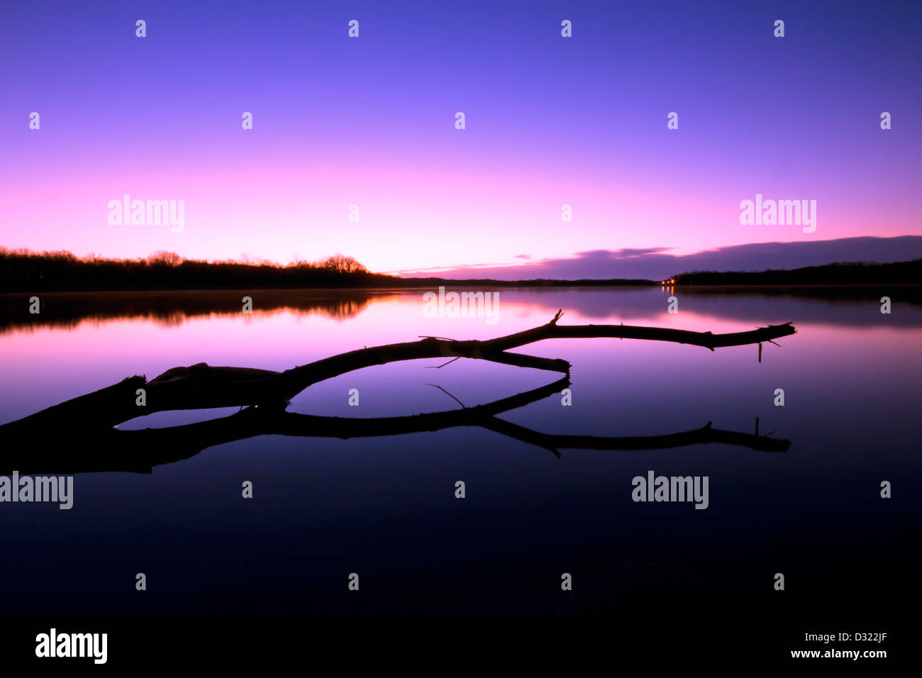 A beautiful sunrise over a lake Stock Photo - Alamy