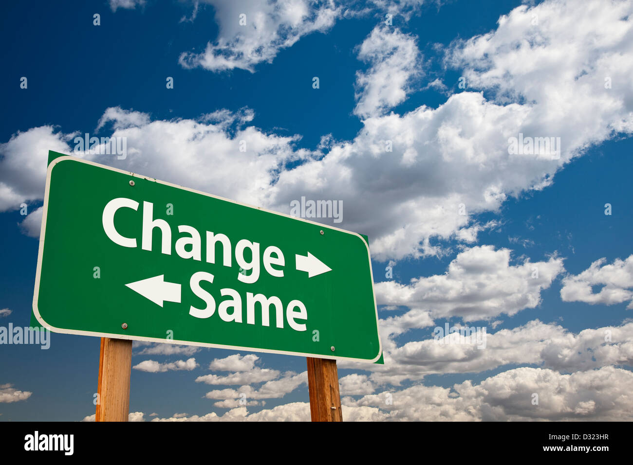 Change, Same Green Road Sign Over Dramatic Clouds and Sky Stock Photo ...