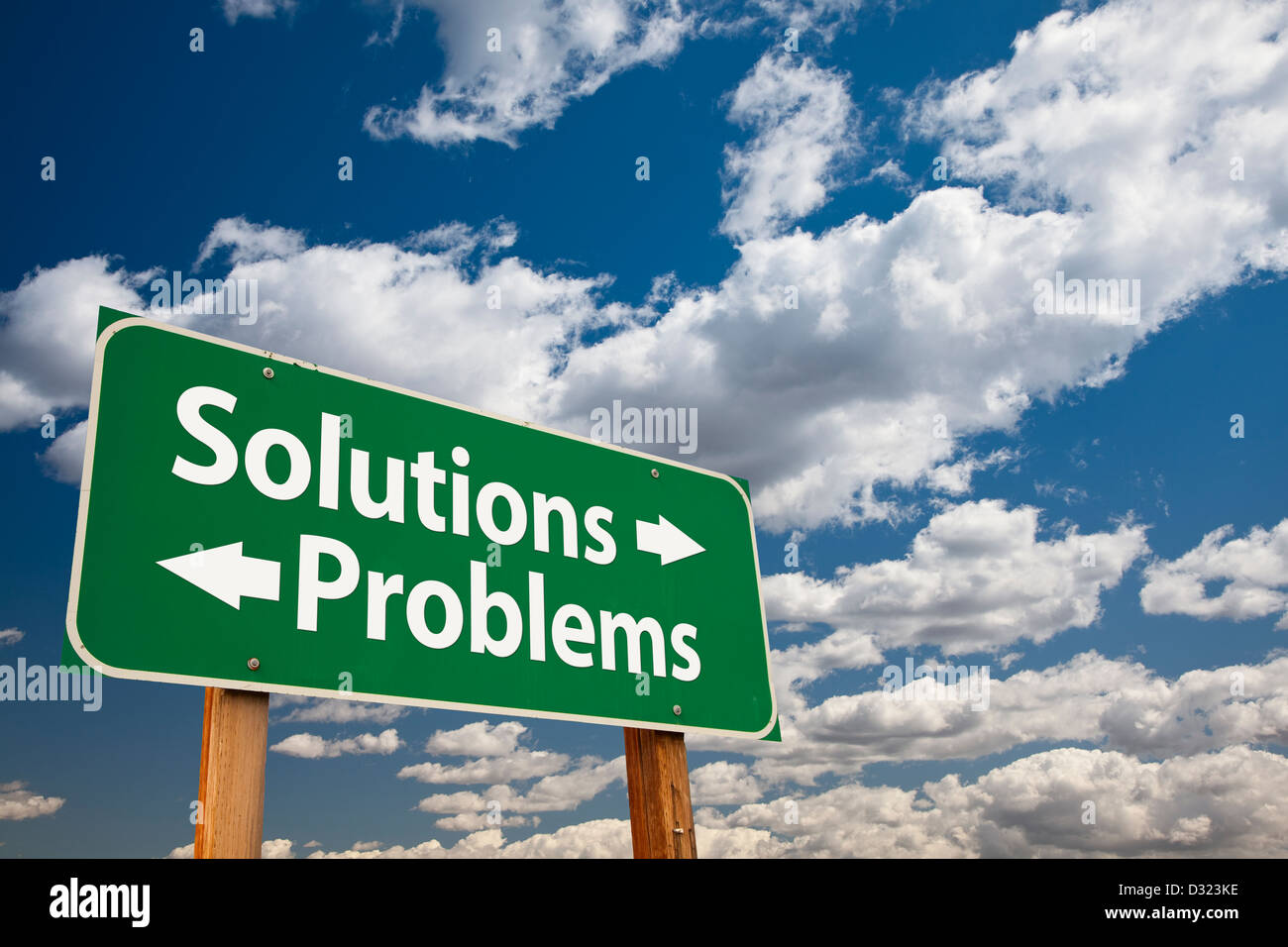 Solutions, Problems Green Road Sign Over Dramatic Clouds and Sky Stock ...