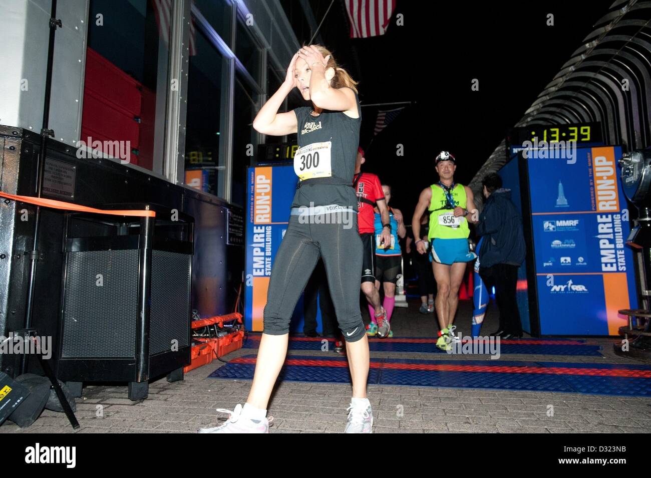 Feb. 6, 2013 - Manhattan, New York, U.S. - KELLY RIPA crosses the ...