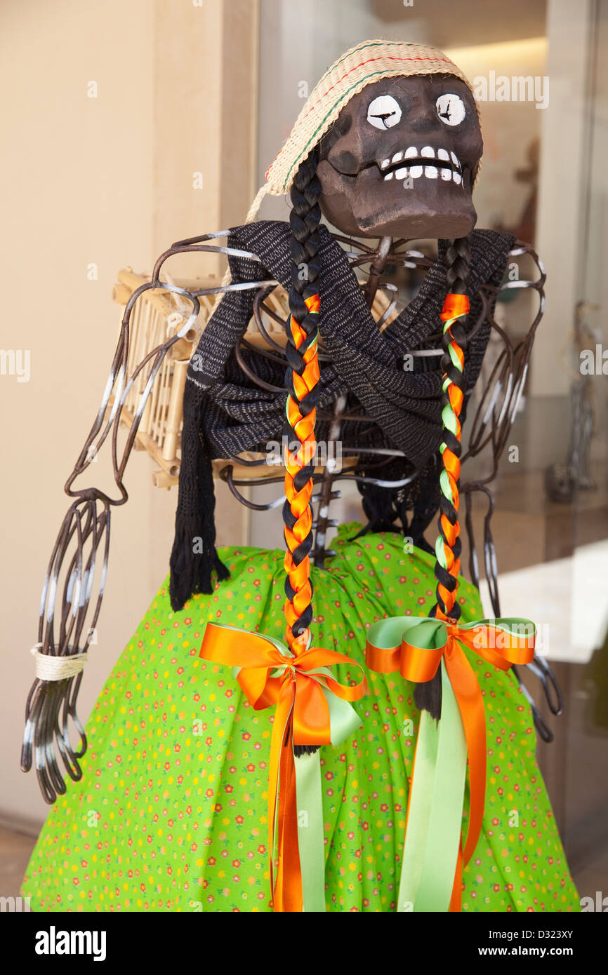 Indigenous-looking skeleton mannequin with braids on display during Day ...