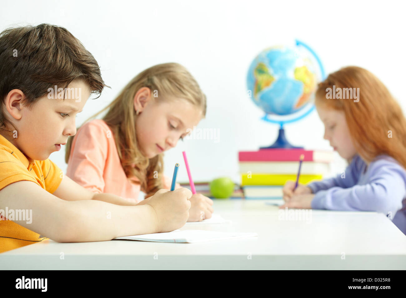 Group of schoolmates drawing at lesson Stock Photo - Alamy