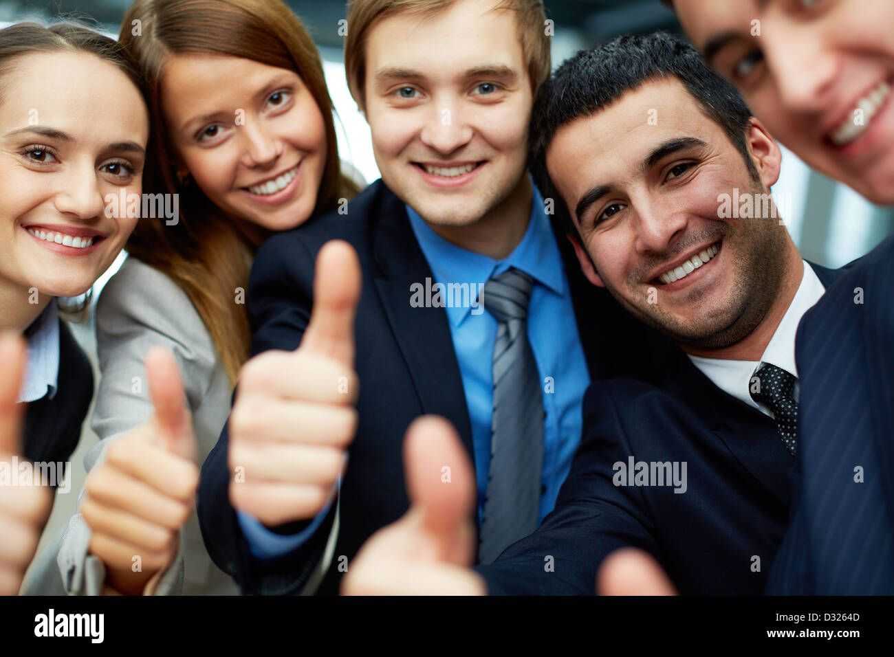 Thumbs up female employee looking hi-res stock photography and images ...