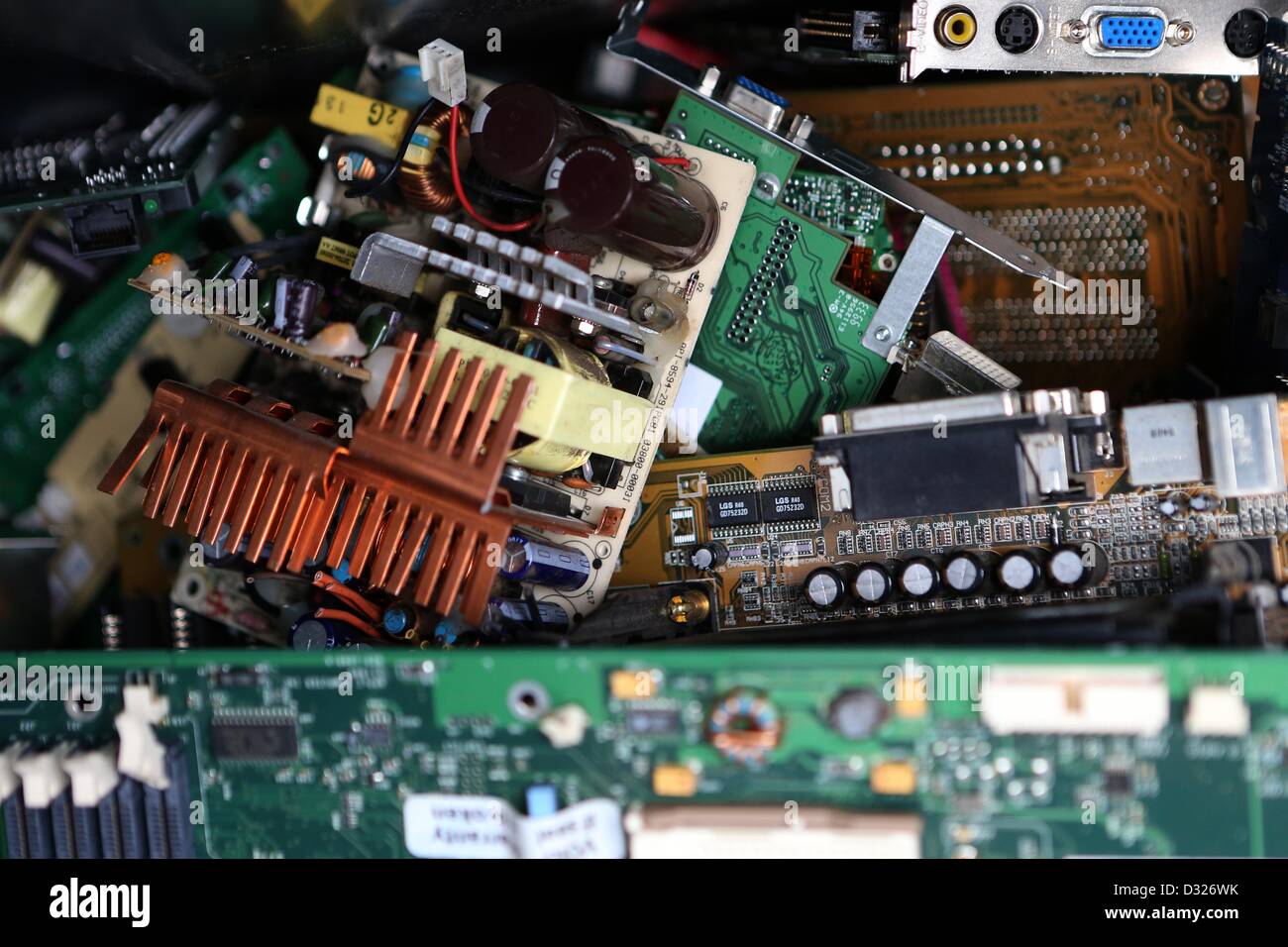 Computer circuit boards are piled in a consolidated container for ...