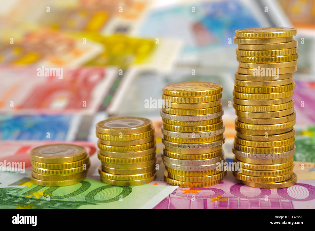 chart with stacked euro coins on euro currency Stock Photo - Alamy