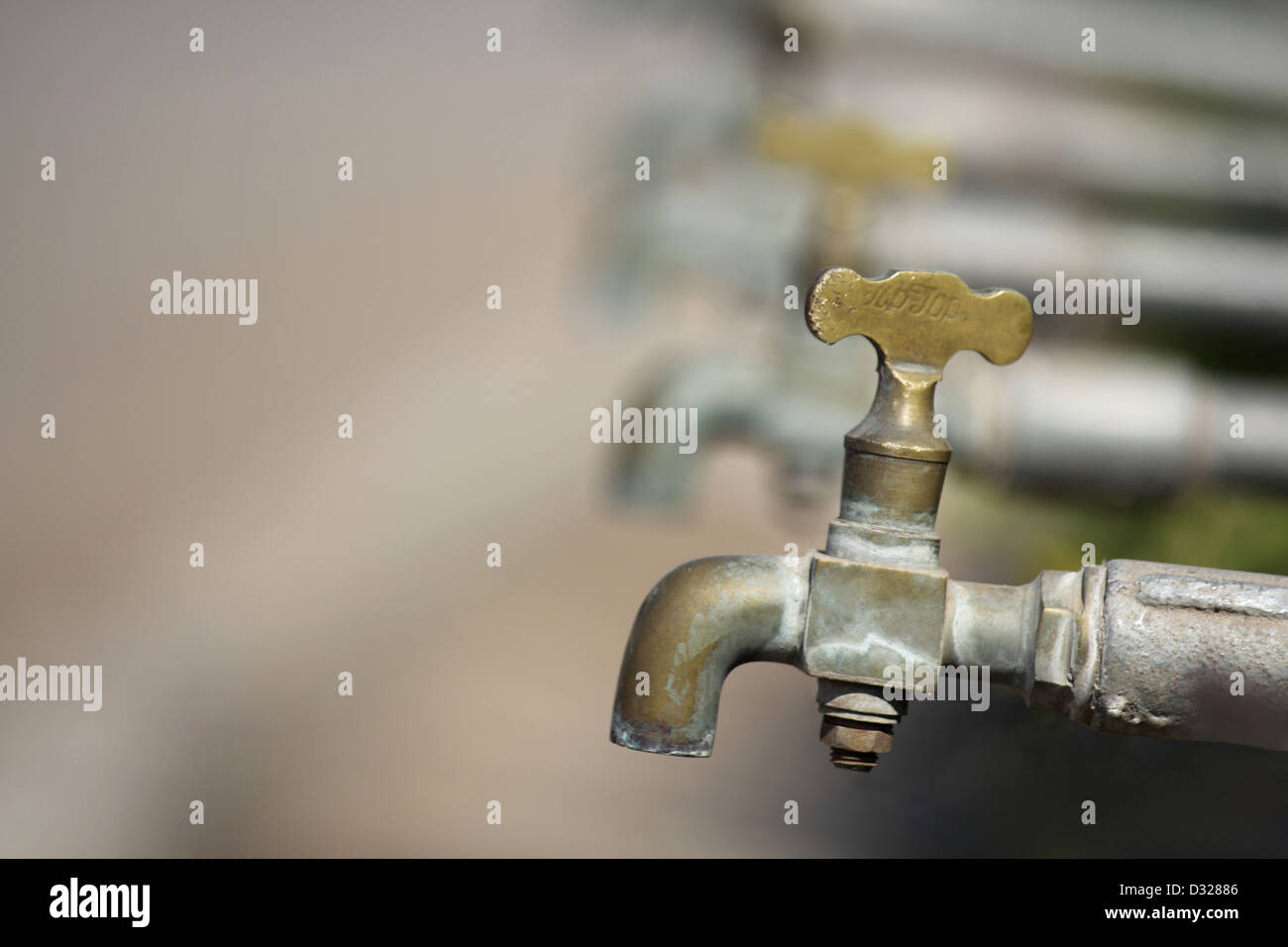 Copper water taps Stock Photo - Alamy