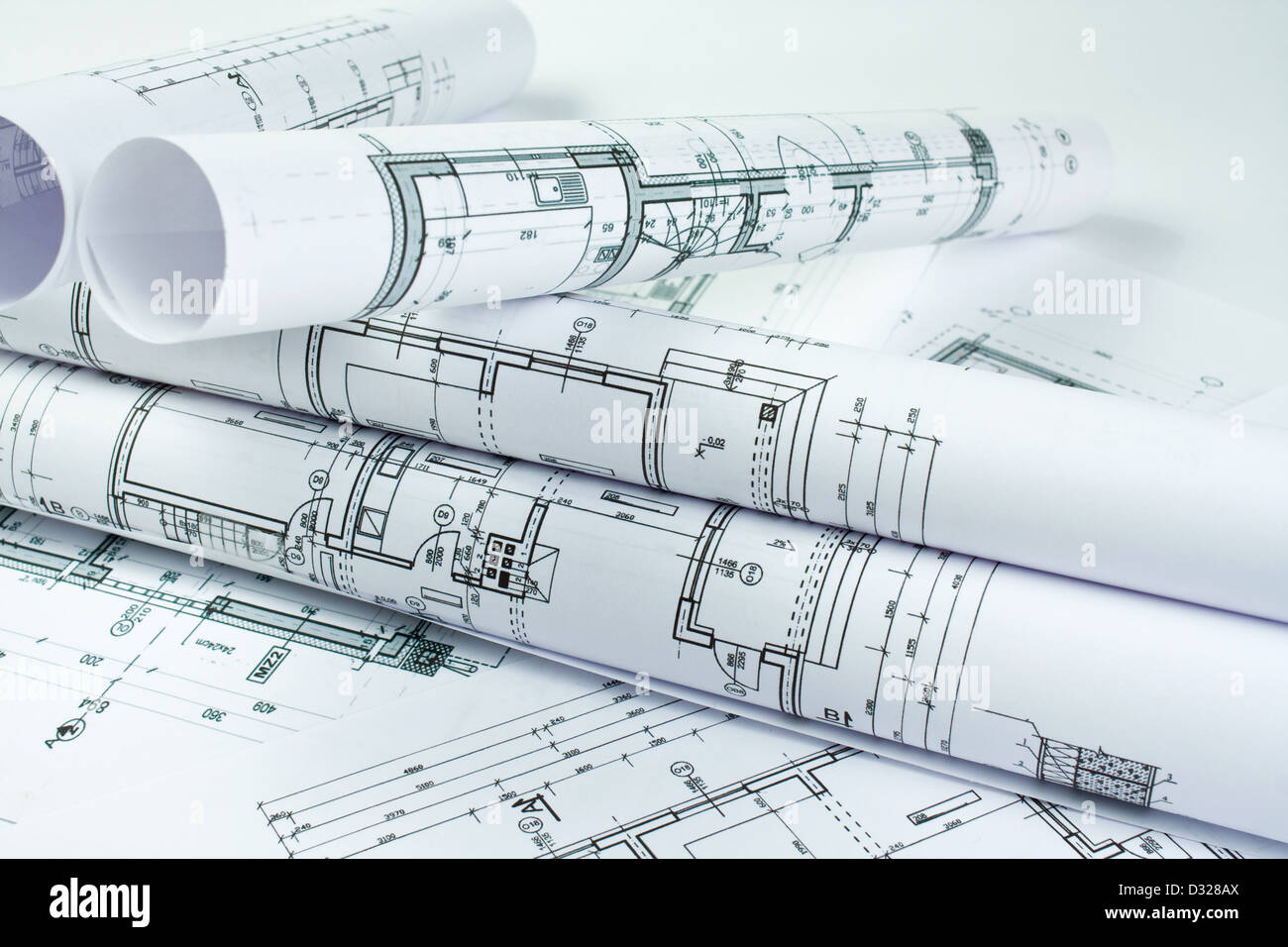 Architect rolls and house plans Stock Photo - Alamy