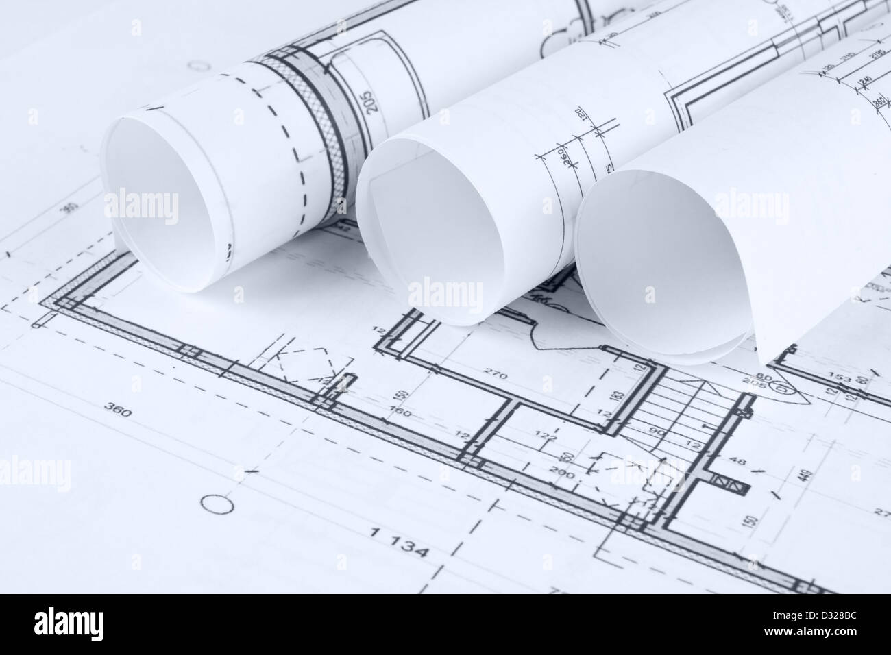 Architect rolls and house plans Stock Photo - Alamy