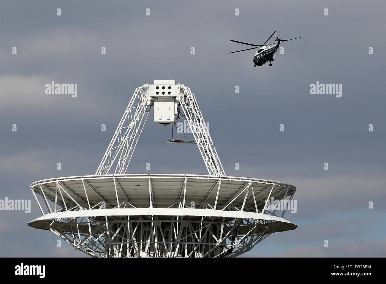 United States President Barack Obama passes near a satellite dish as he ...