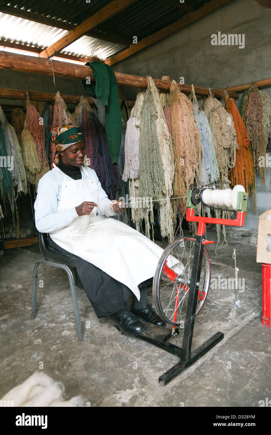 African man spinning thread Stock Photo - Alamy