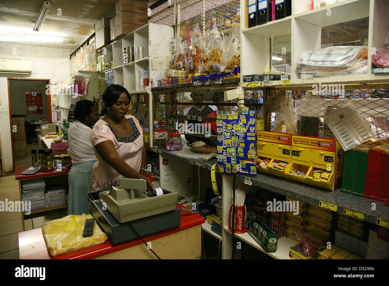 An electric cash register rings up the total in a rural general Stock ...