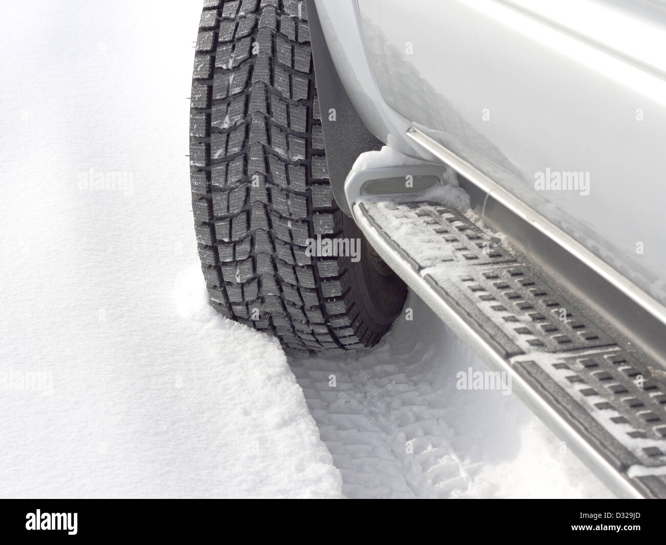 Snowy winter road behind an unrecognizable car Stock Photo - Alamy