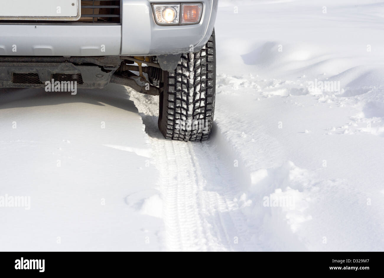 Snowy winter road ahead an unrecognizable car Stock Photo - Alamy