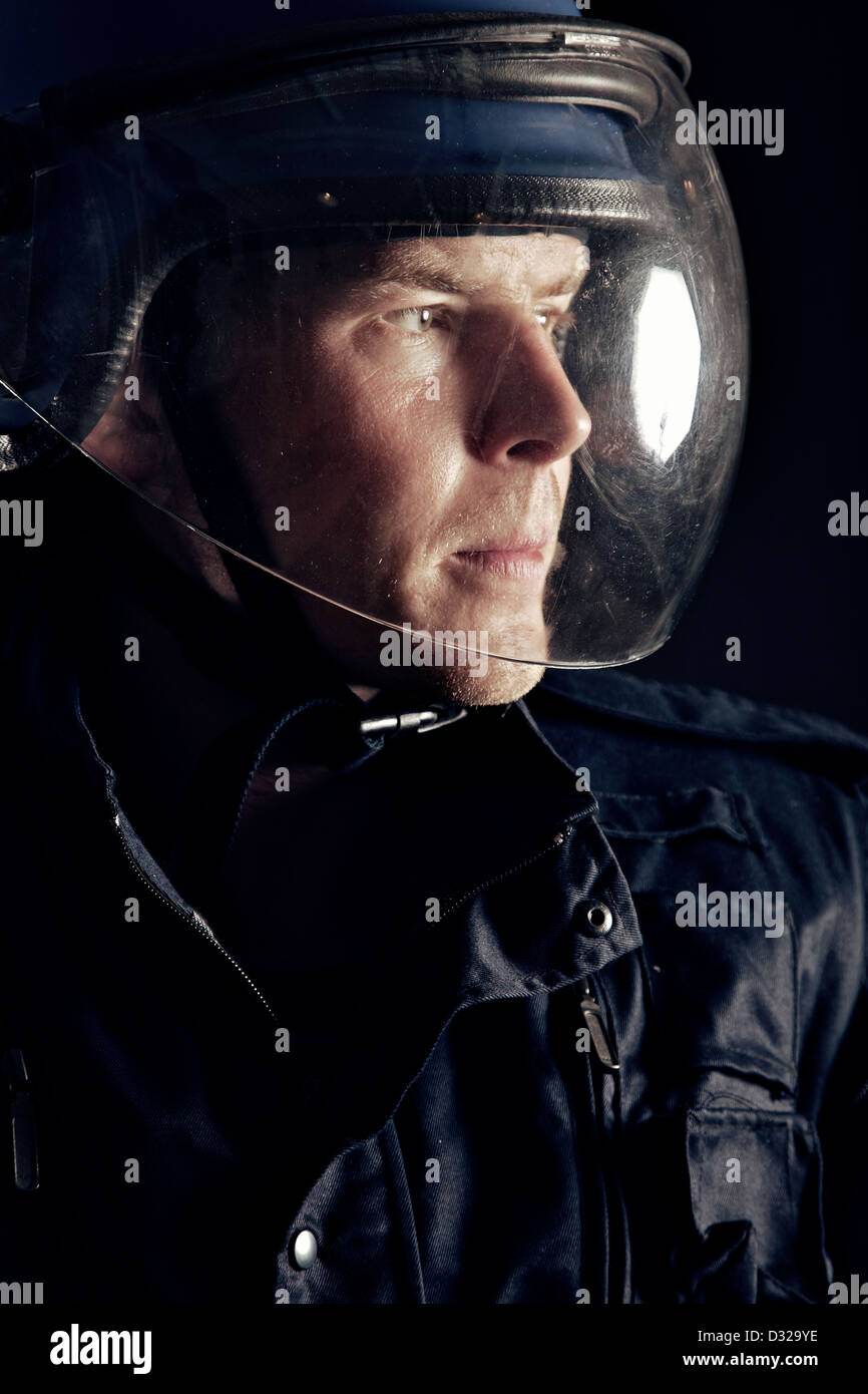 Policeman wearing helmet hi-res stock photography and images - Alamy