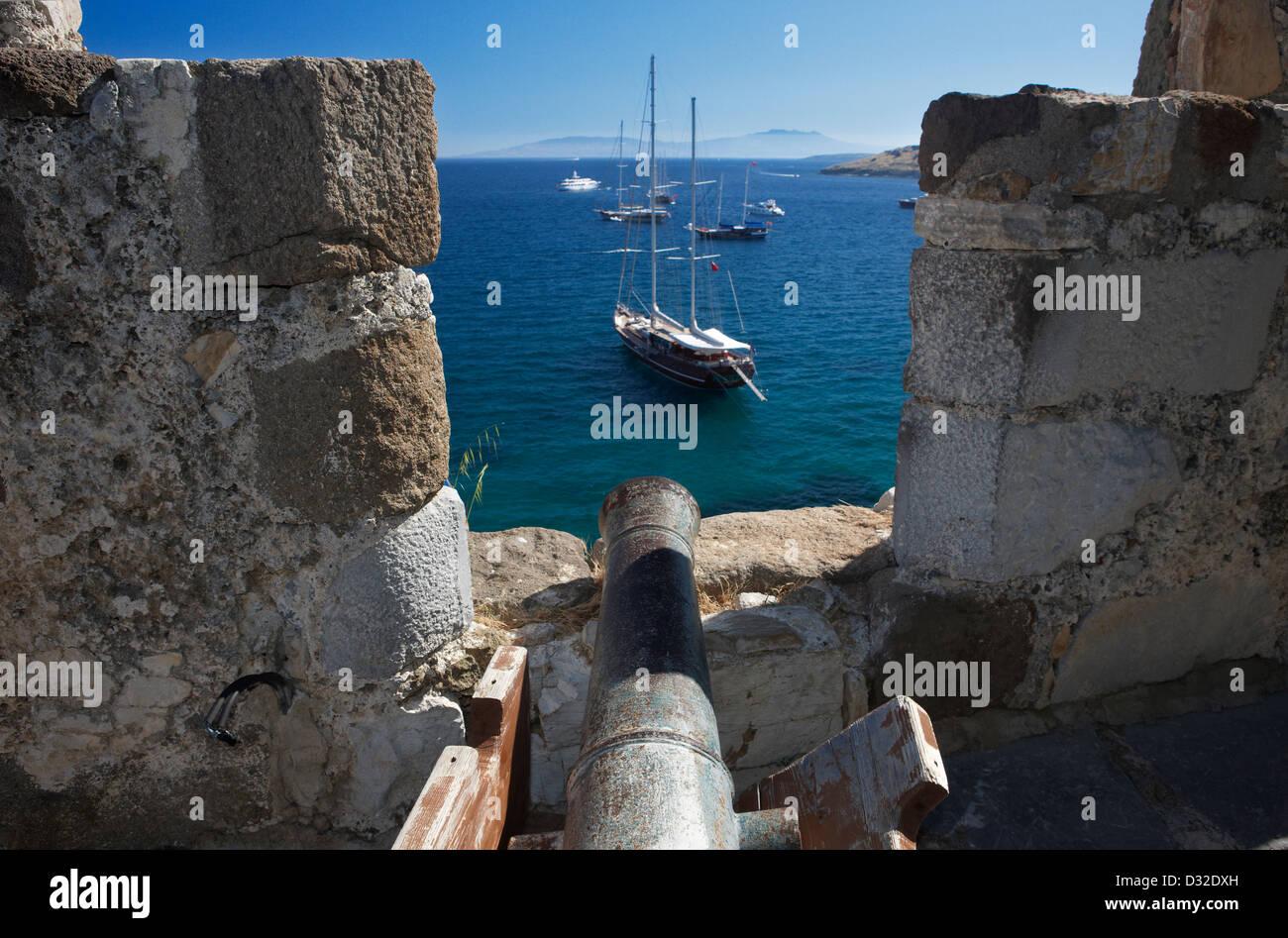 Old cannon in an embrasure on the outer wall of medieval Castle of The ...