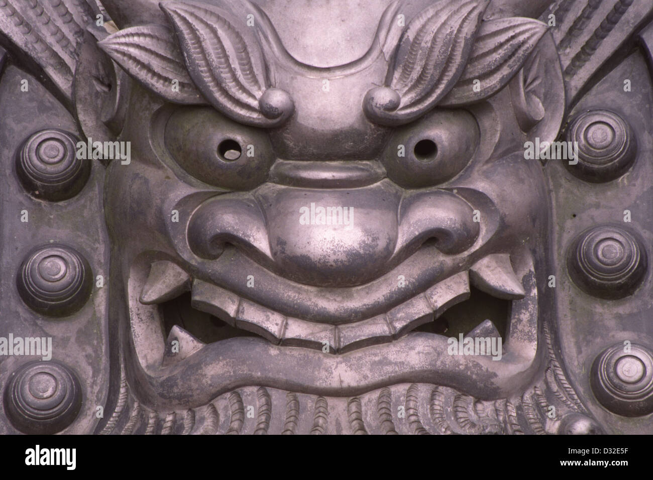 Onigawara, a traditional Japanese roof tile featuring a devilish face ...